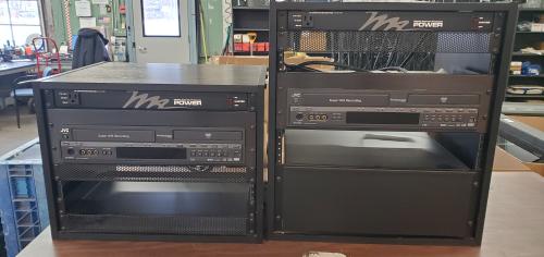 Lot of 2 Used JVC SR-MV55 VHS/DVD Recorders mounted in Wooden Racks.