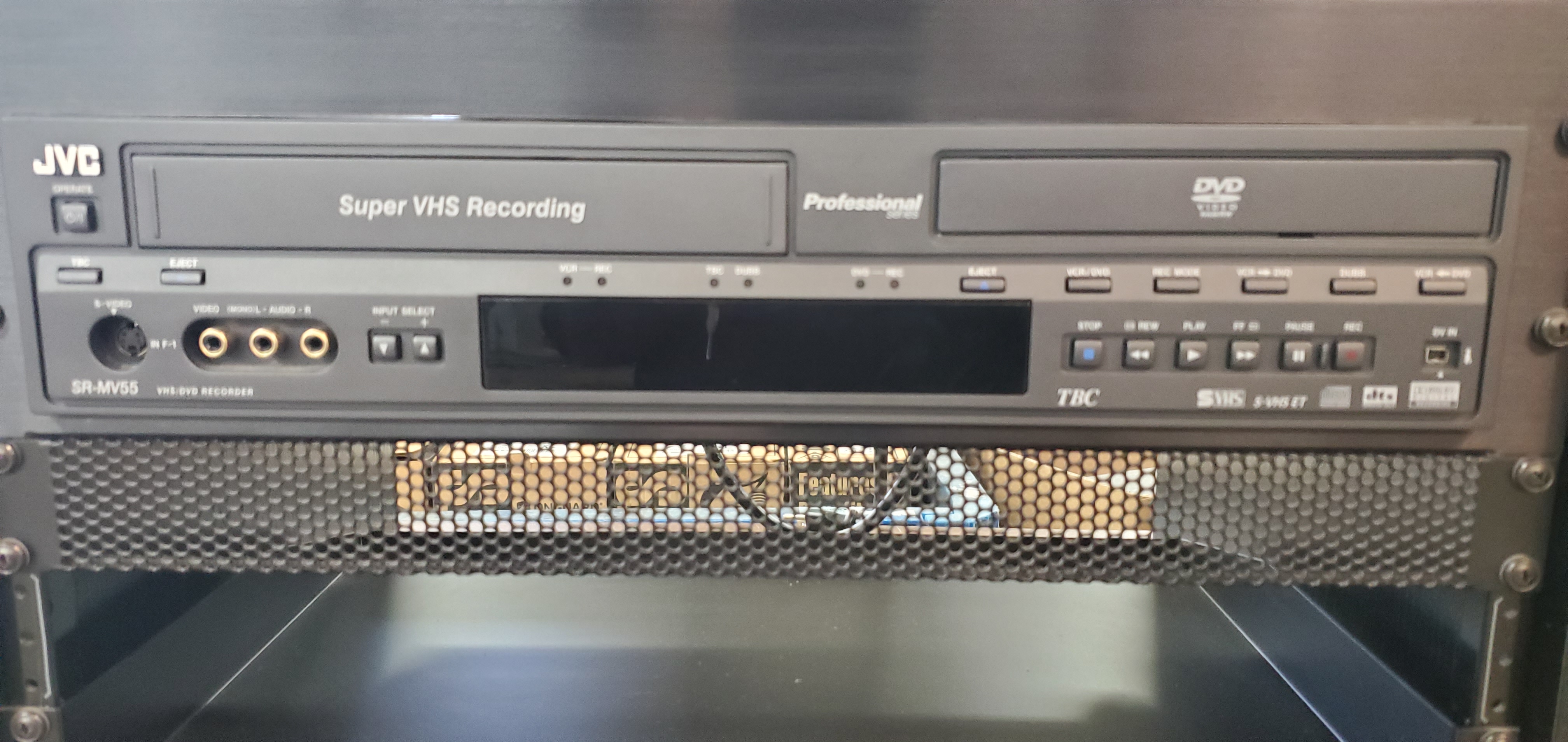 Lot of 2 Used JVC SR-MV55 VHS/DVD Recorders mounted in Wooden Racks.