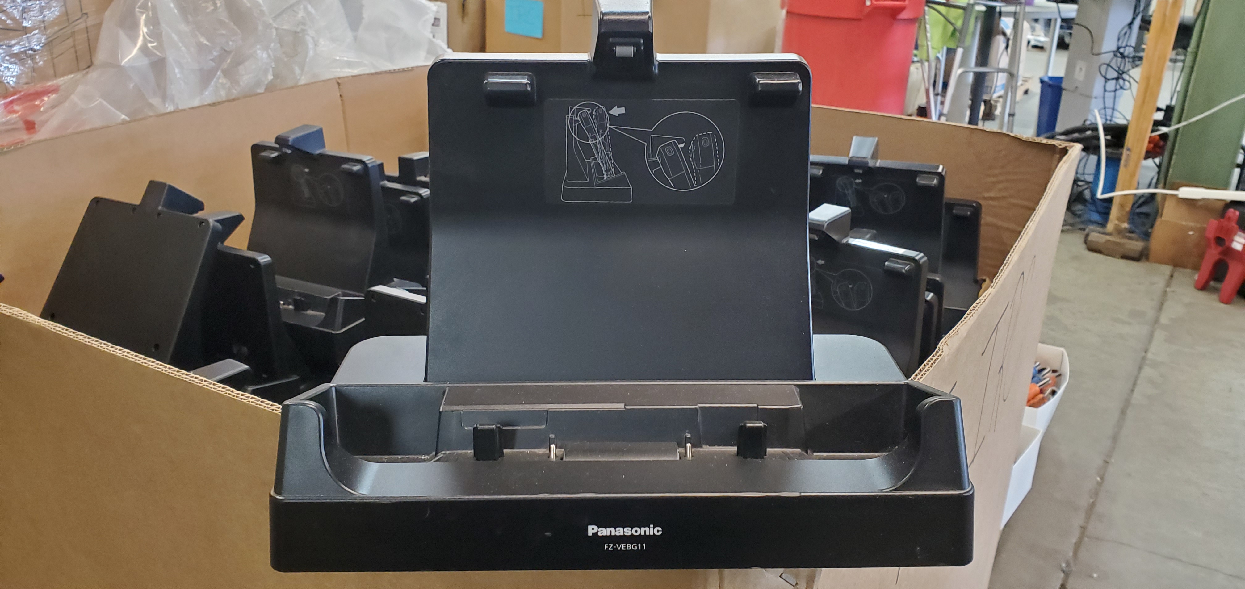 Lot of 54 Panasonic FZ-VEBG11 Docking Stations, power supplies not included.